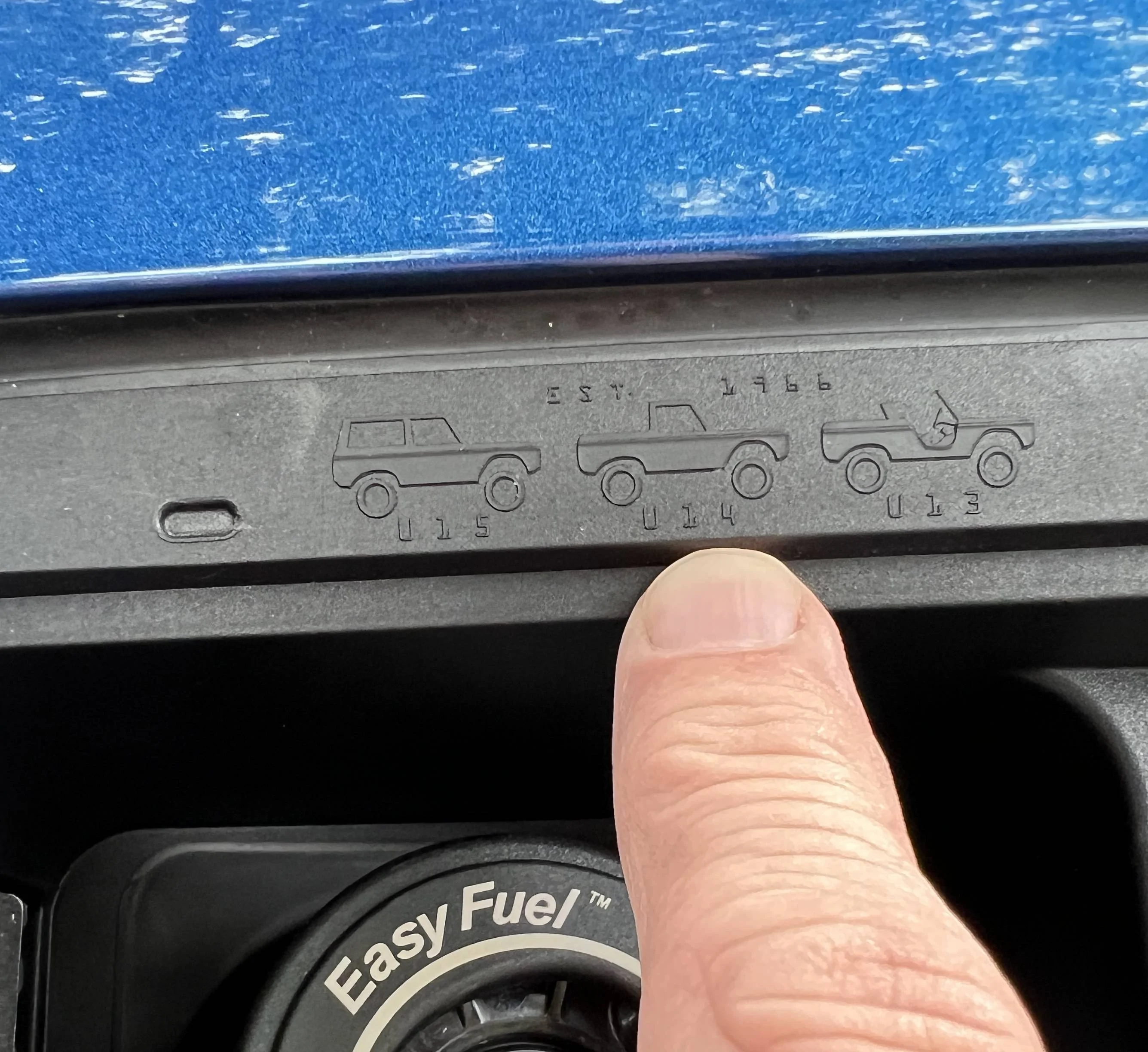 Weird question: purpose of the image of a little car in the rear window ...